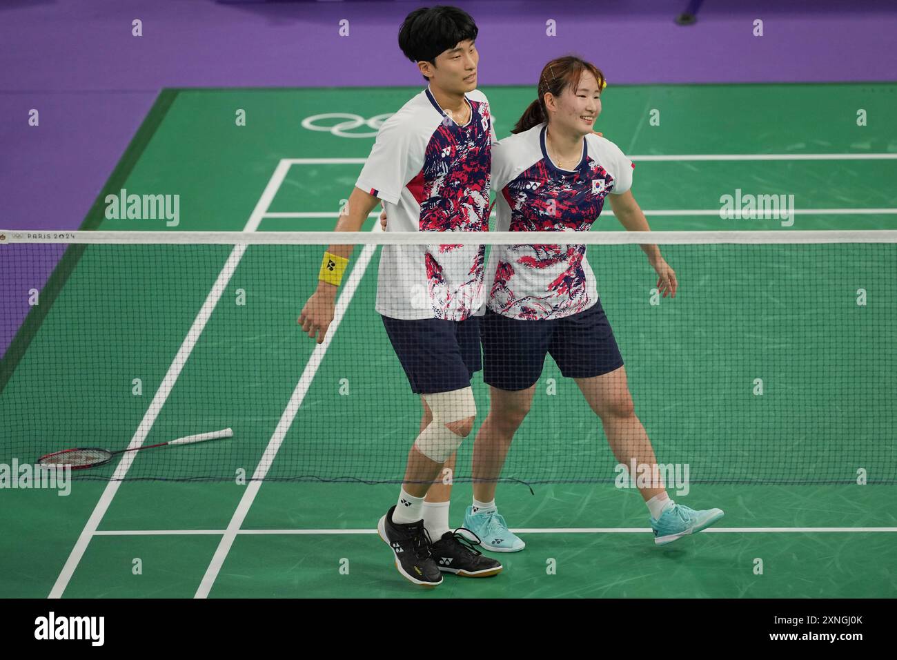 South Korea's Kim Won-ho, left, and Jeong Na-eun celebrate after defeating Malaysia's Chen Tang ...