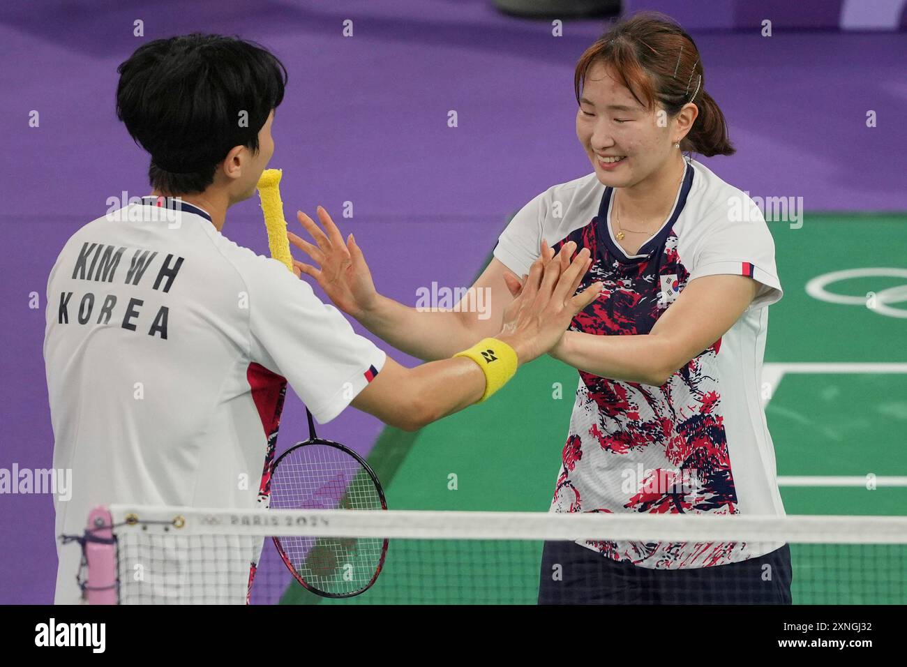 South Korea's Kim Won-ho, left, and Jeong Na-eun celebrate after defeating Malaysia's Chen Tang ...