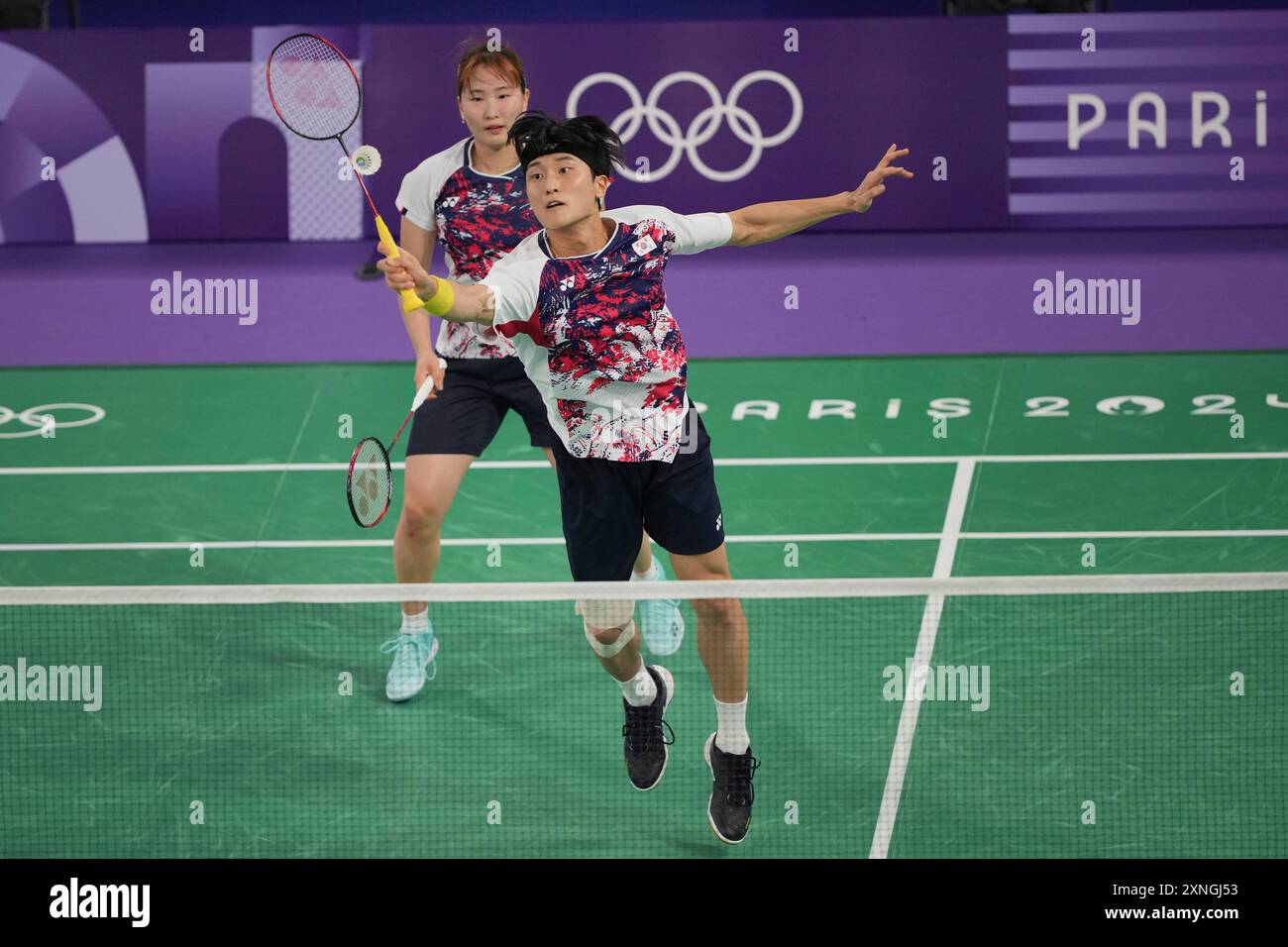 South Korea's Kim Won-ho, right, and Jeong Na-eun play against Malaysia's Chen Tang Jie and Toh ...