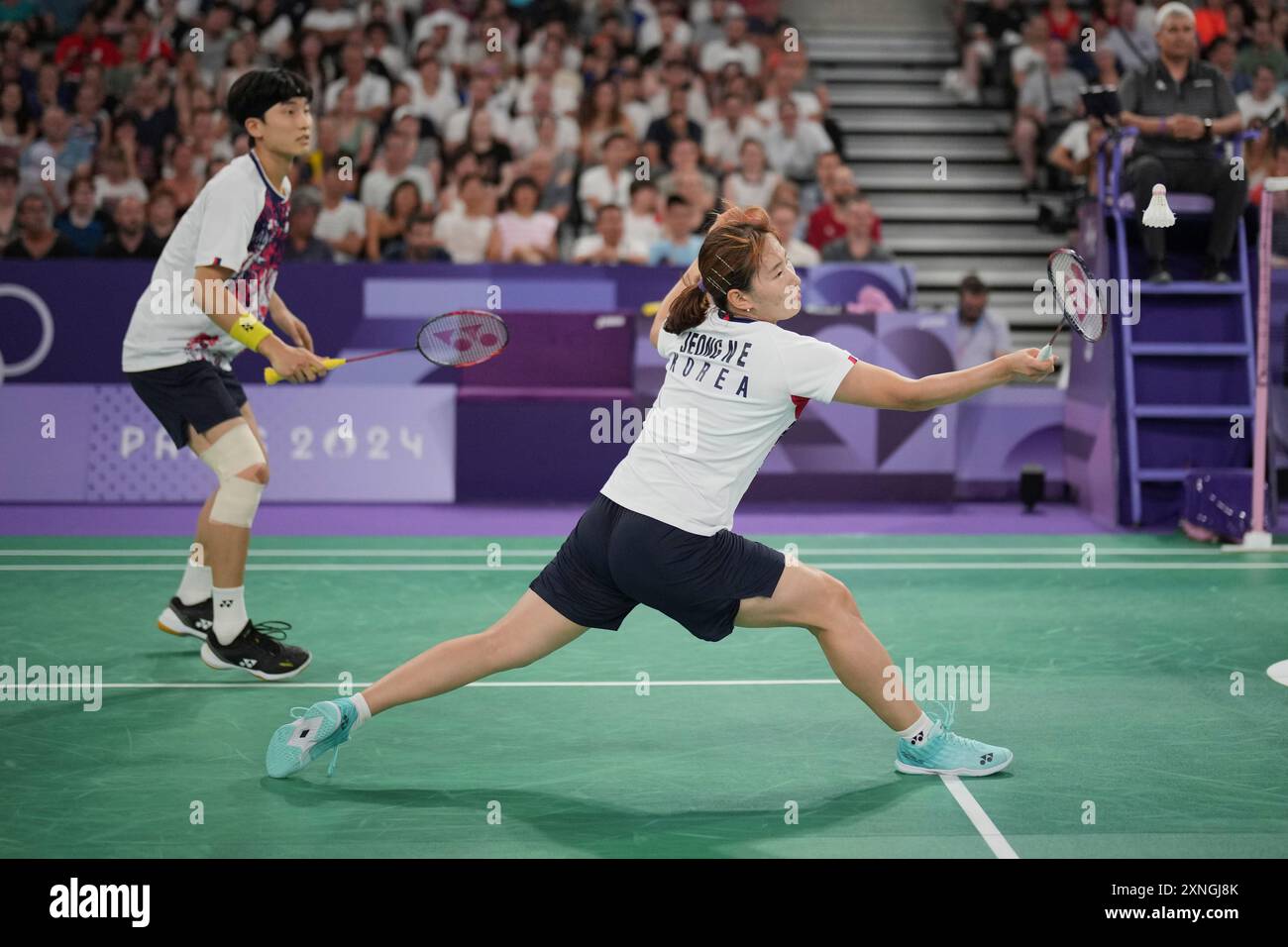 South Korea's Kim Won-ho, left, and Jeong Na-eun play against Malaysia's Chen Tang Jie and Toh ...