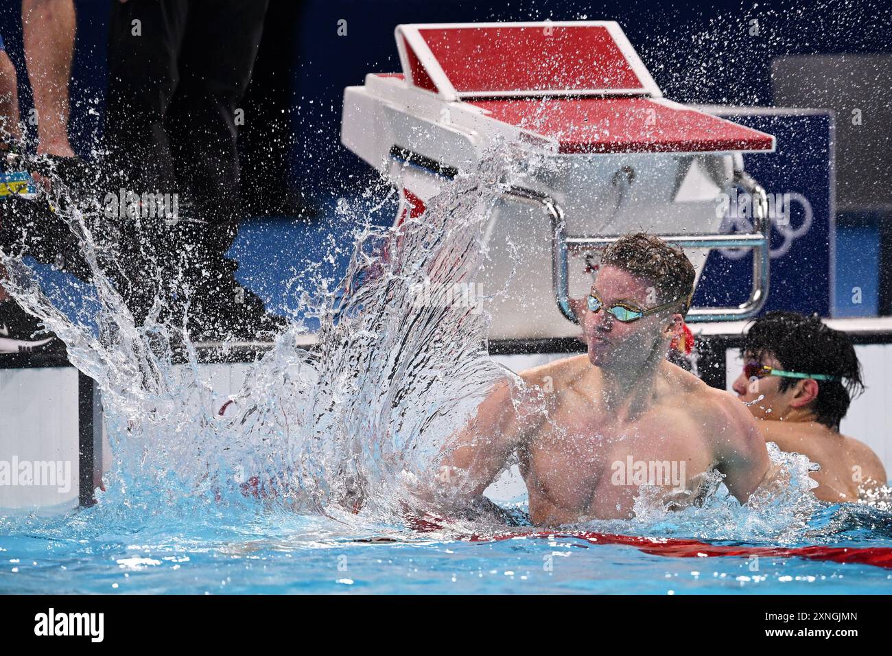 Paris, France. 31st July, 2024. French swimmer Léon Marchand reacts ...