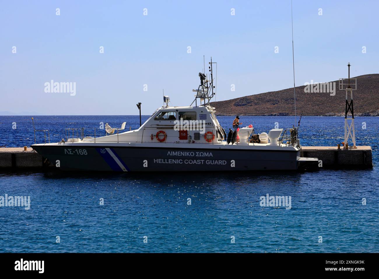 Livadia harbour with Hellenic Coast Guard boat moored, Tilos Island ...