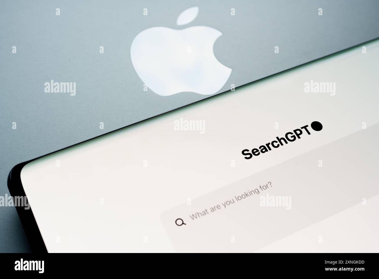OpenAI SearchGPT page seen on the smartphone screen placed next to ...