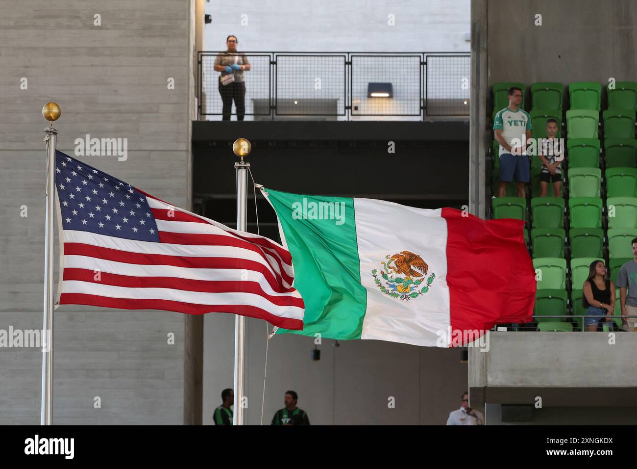 AUSTIN, TX - JULY 30: The Unites States and Mexico flags waive in the ...