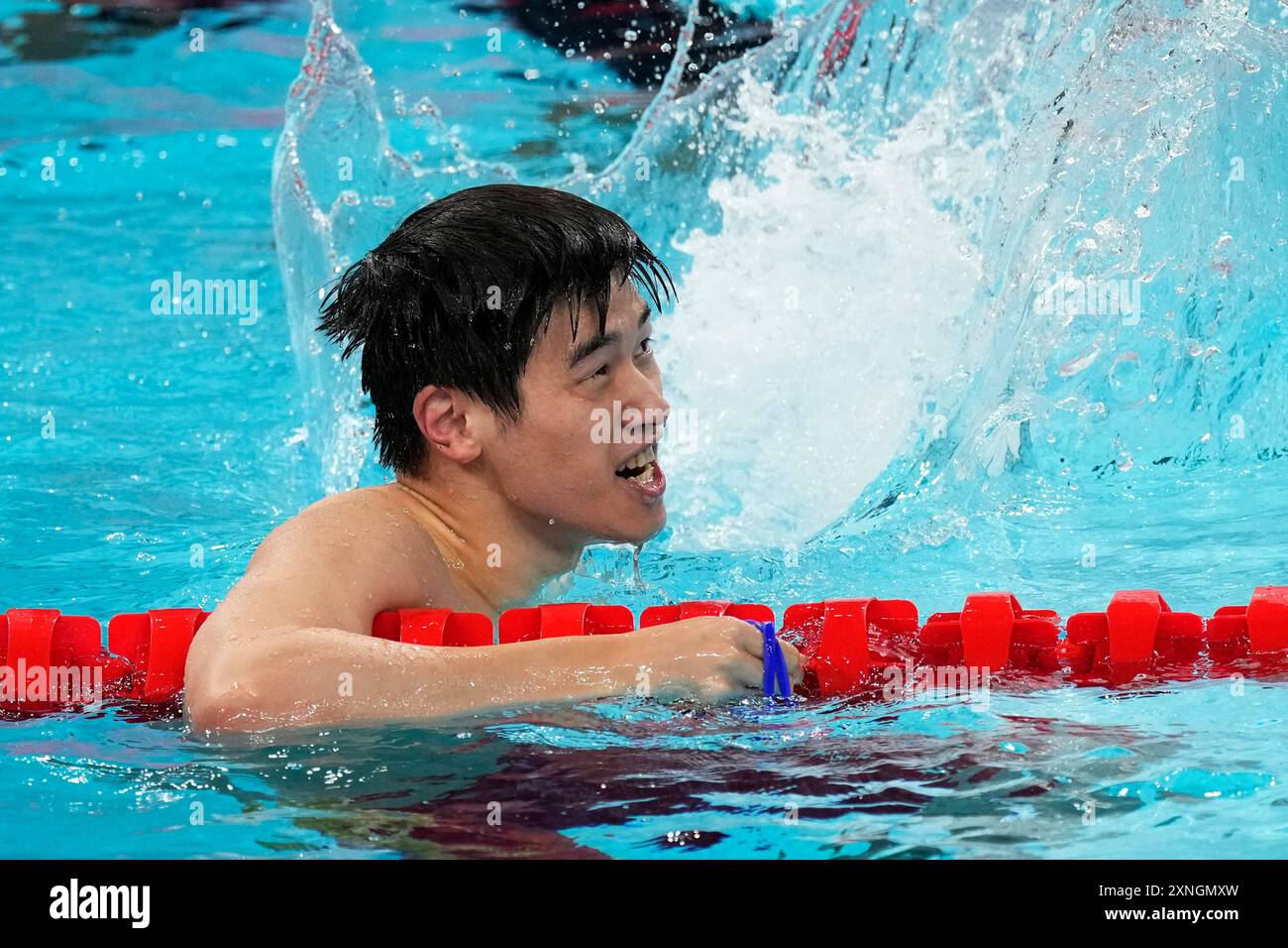 Pan Zhanle, of China, celebrates after winning the men's 100-meter ...