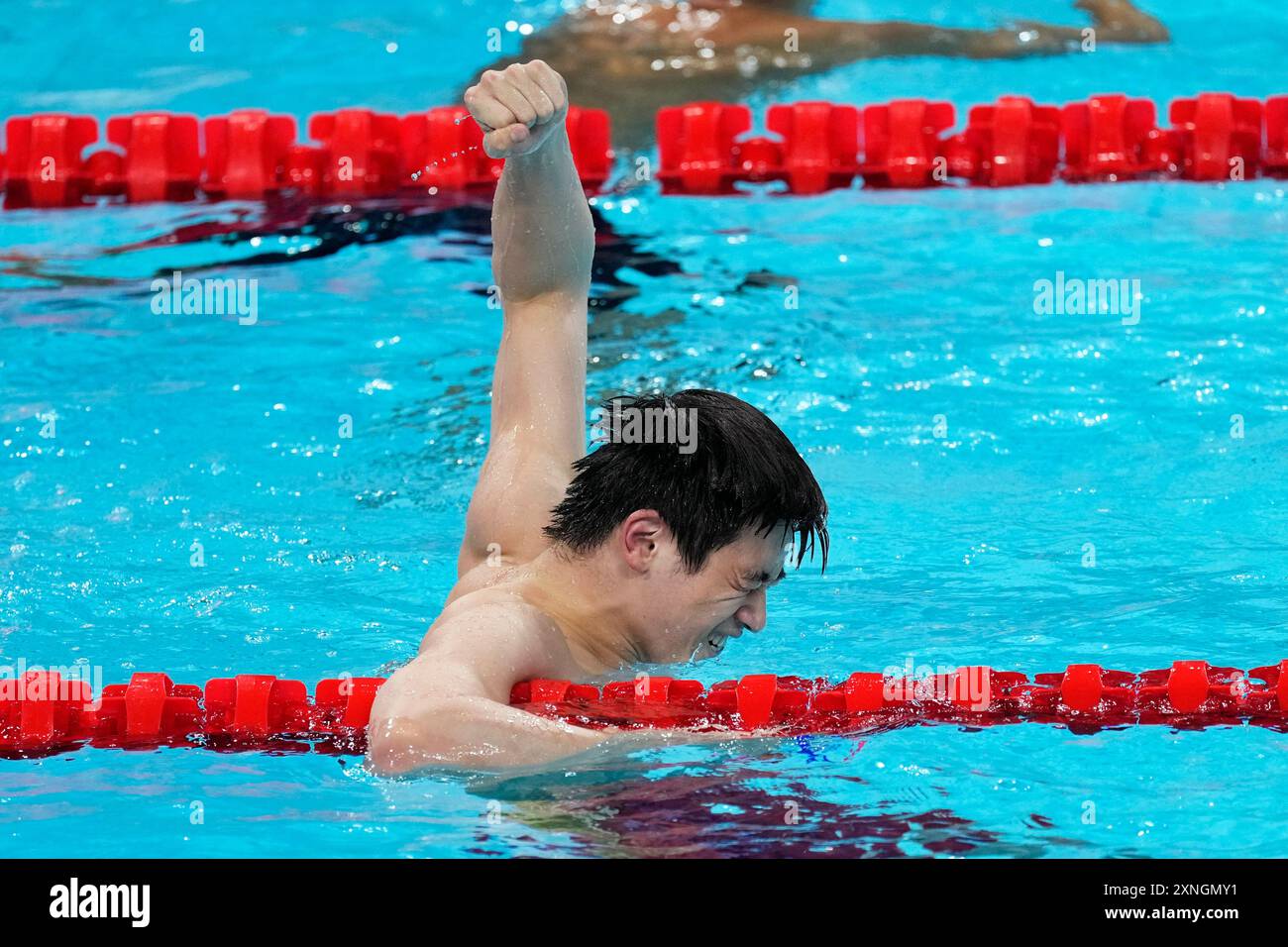 Pan Zhanle, of China, celebrates after winning the men's 100-meter ...