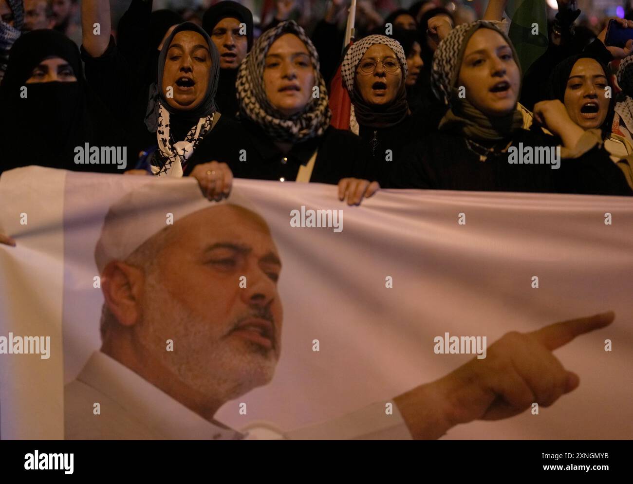 People protest to condemn the killing of Hamas leader Ismail Haniyeh ...