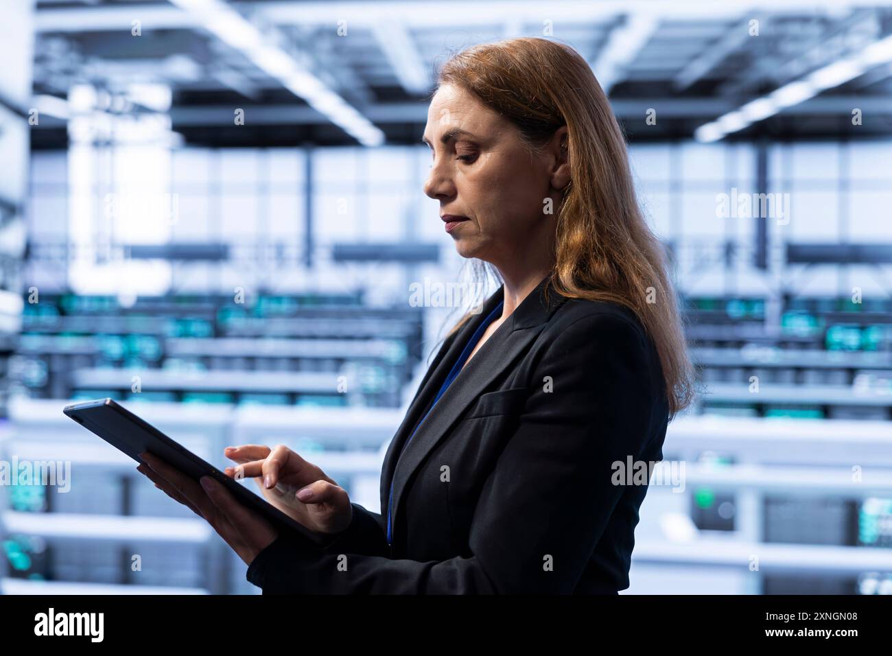 Data center software developer ensuring safety and security of database ...