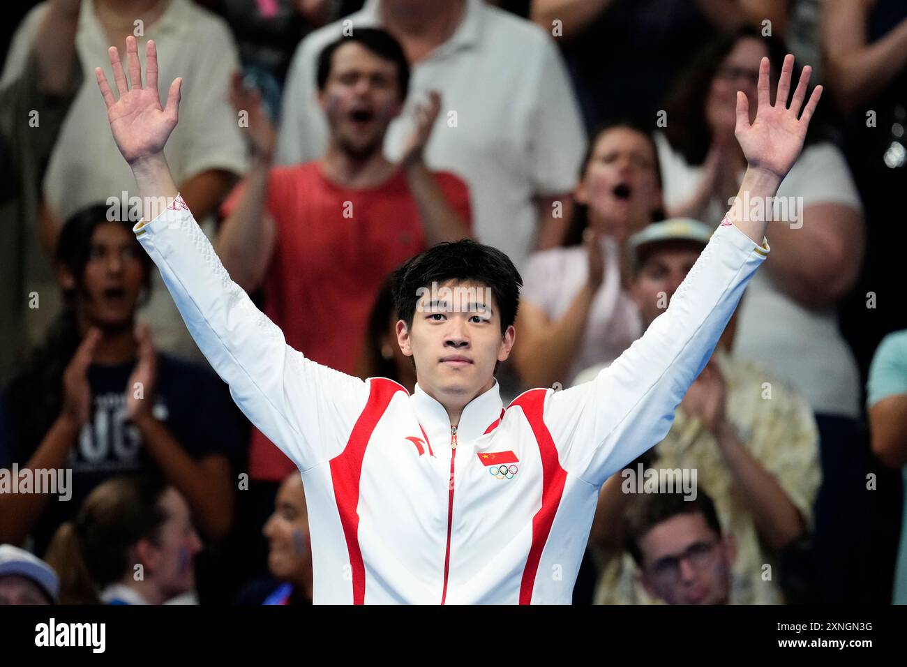 Pan Zhanle, of China, celebrates as he stands on the podium to receive ...