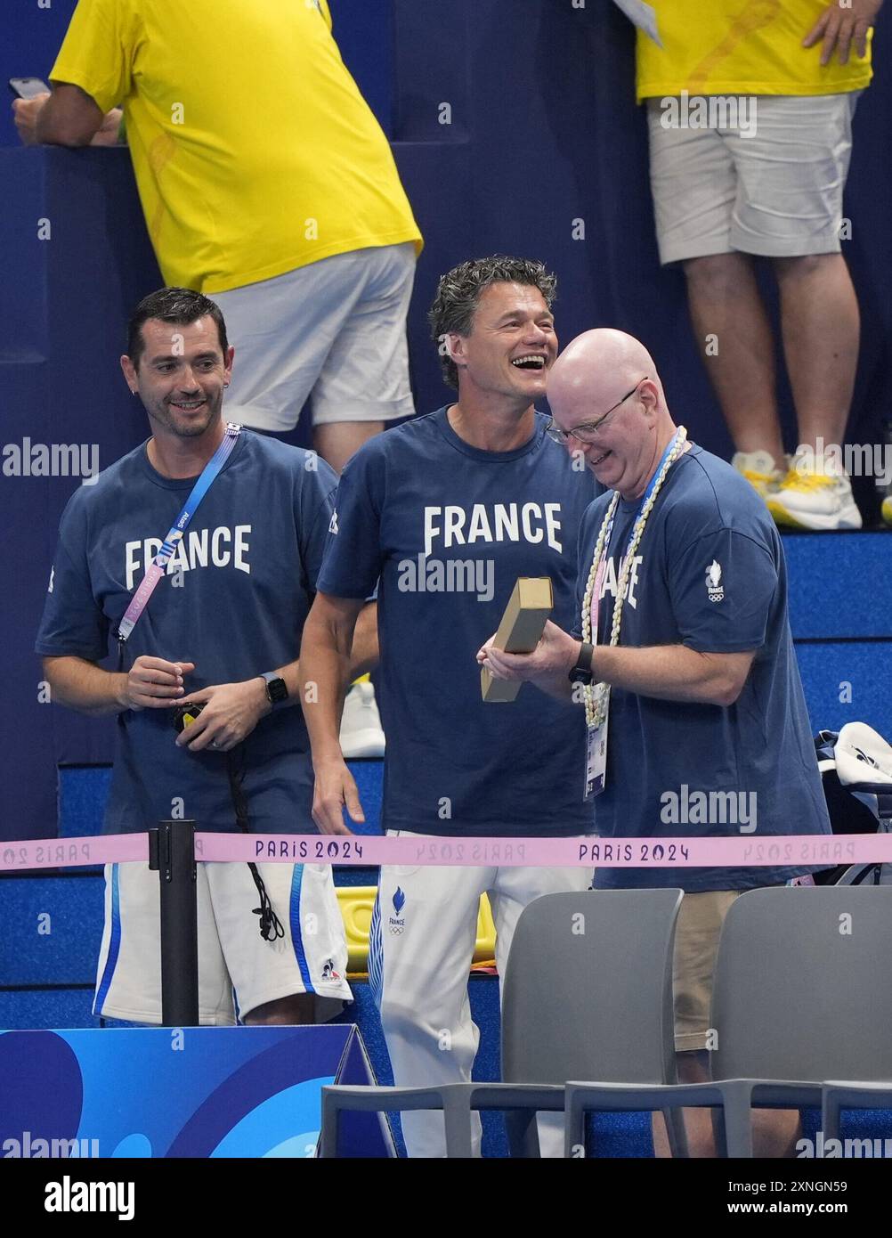 Paris, France. 31st July, 2024. French Coach of Leon Marchand, Nicolas ...