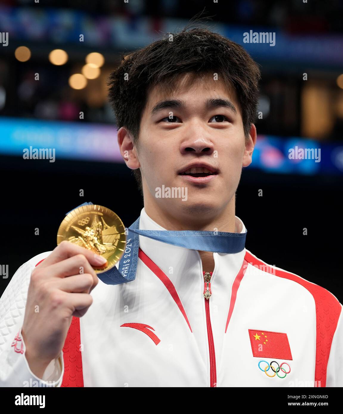 China's Zhanle Pan poses with his gold medal after winning the men's ...