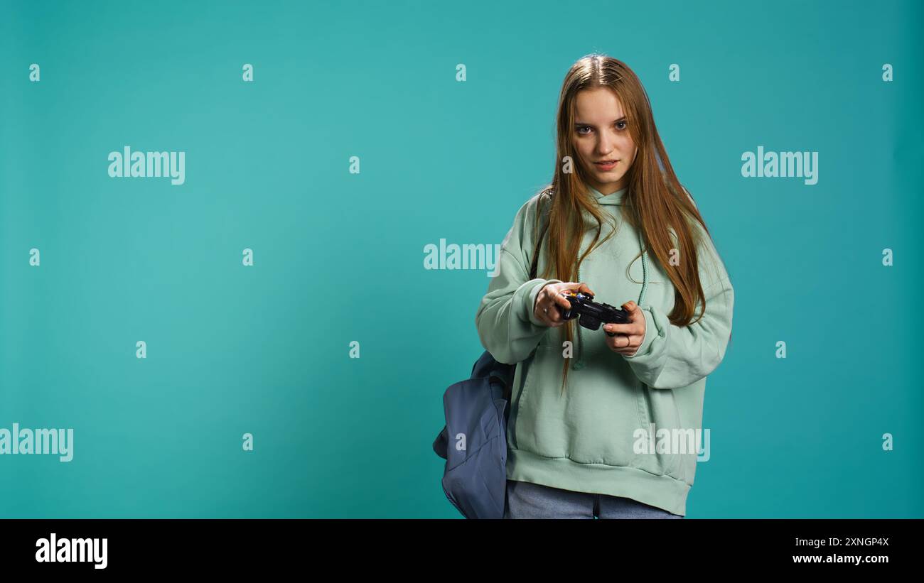 Euphoric woman playing intense gaming console game, celebrating win ...