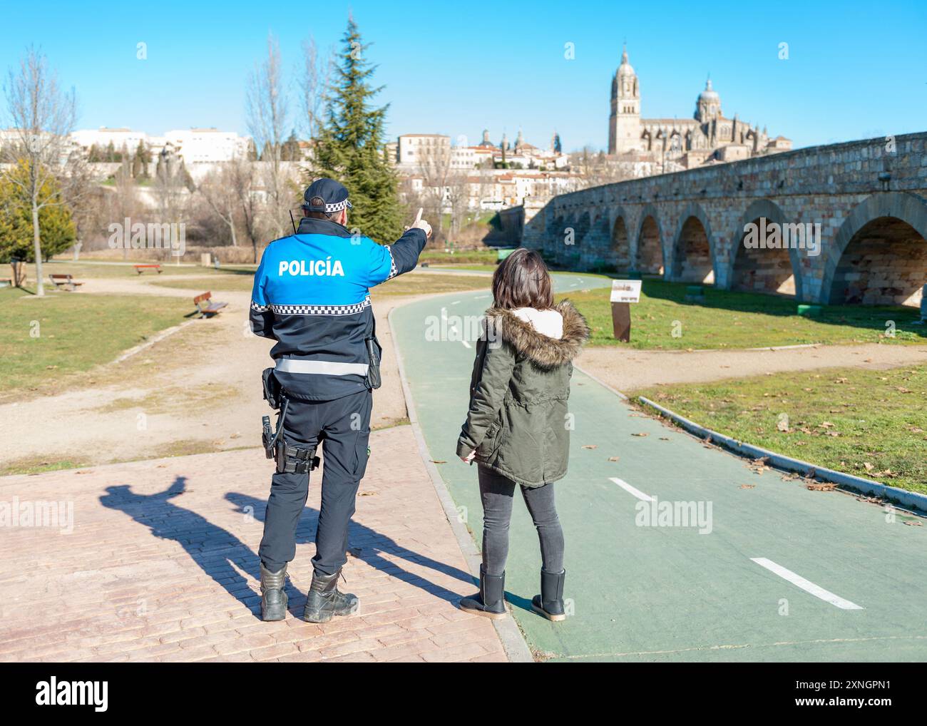 Local police in the foreground uniformed speaking Stock Photo - Alamy
