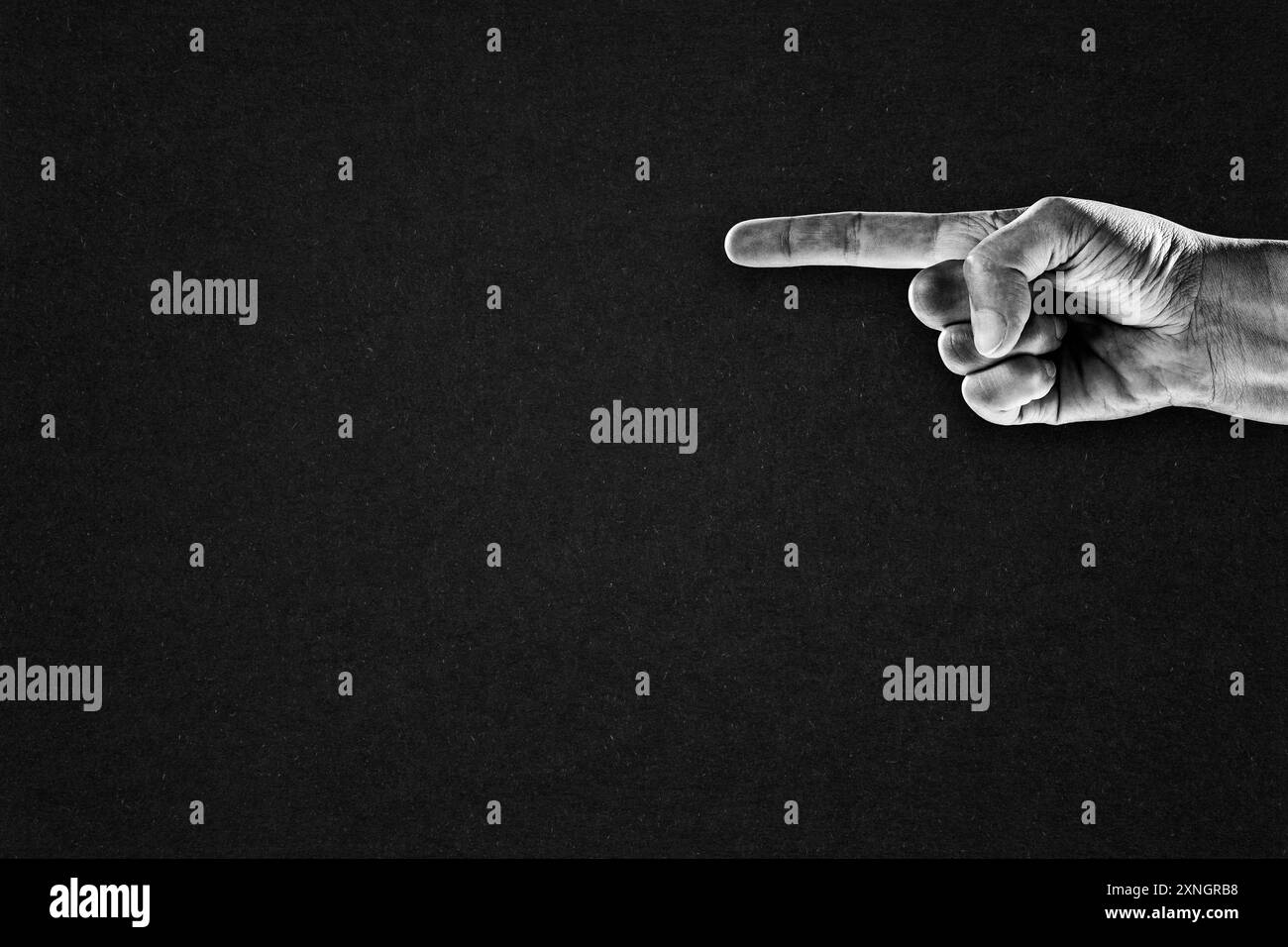 Hand Pointing Sign in Black and White on Textured Paper Background ...