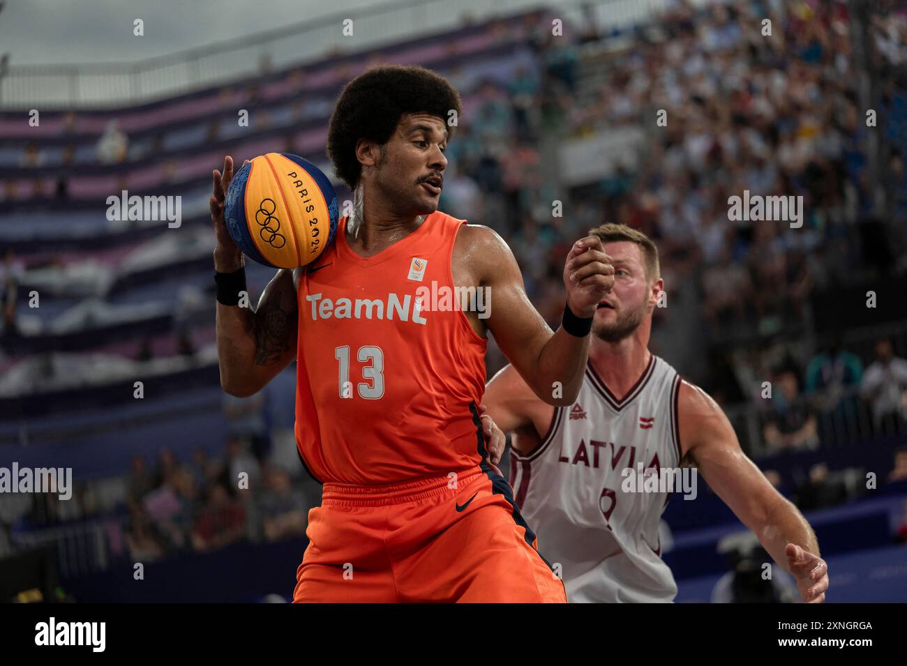 Paris, France. 12th Mar, 2024. Action during the men's pool round 3x3 basketball game between ...