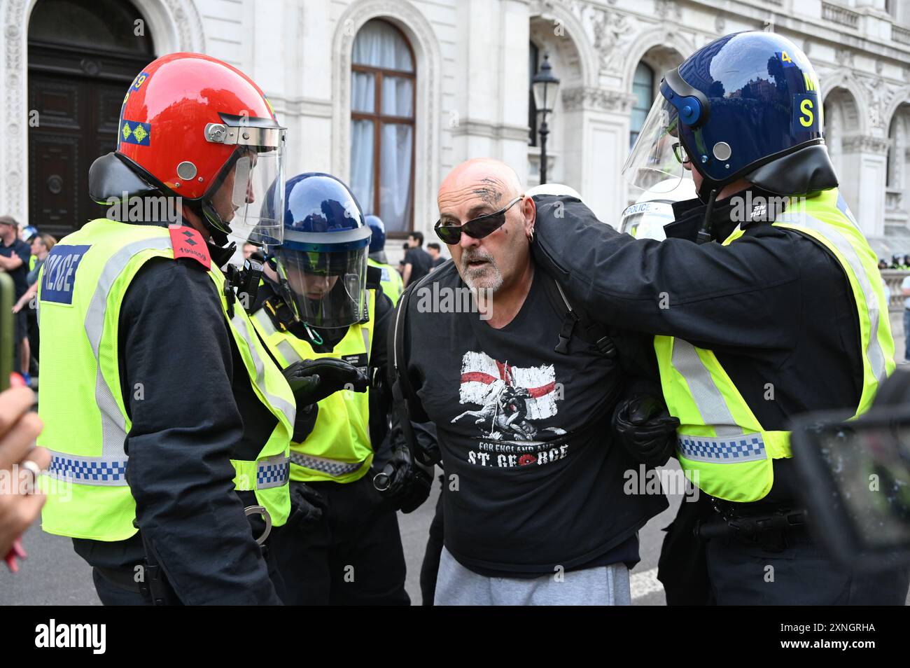 LONDON, ENGLAND - JULY 31 2024: Police arrested a protesters clashed ...