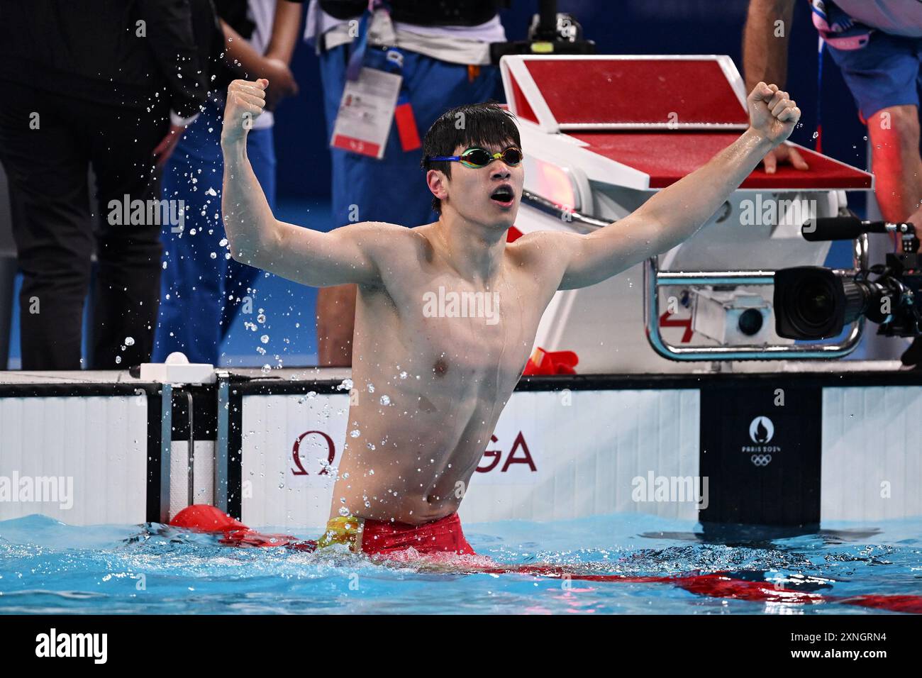 Paris, France. 31st July, 2024. Chinese swimmer Pan Zhanle reacts after ...
