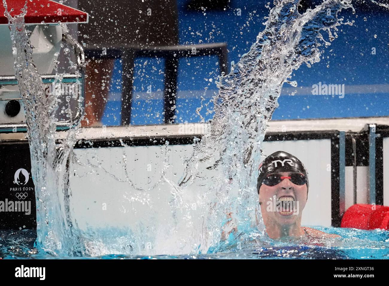 Katie Ledecky, of the United States, celebrates after winning the women ...