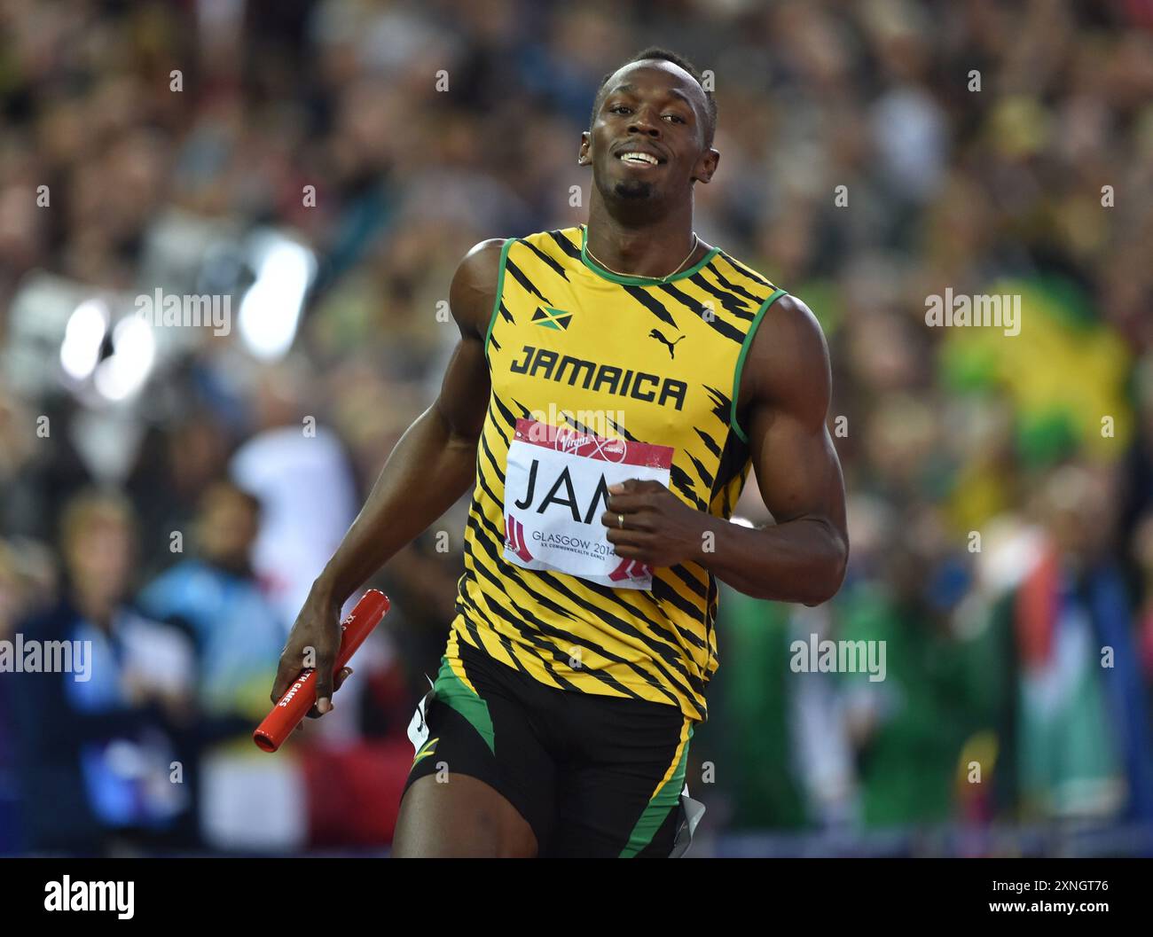 Glasgow Commonwealth Games 2014. Hampden Park. Men's 4x100 Relay final. Usain Bolt running the ...
