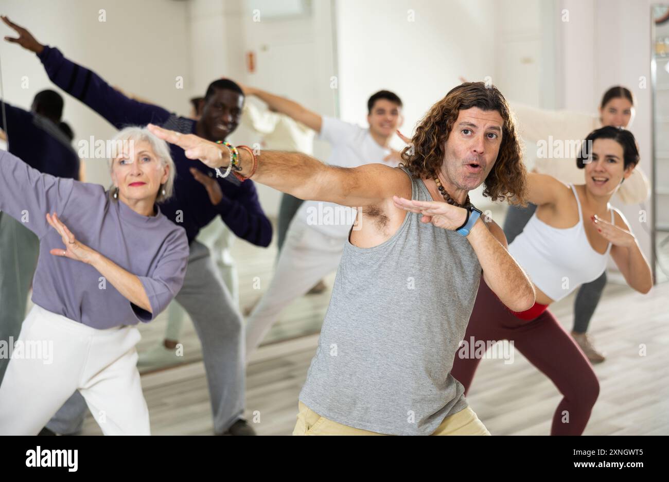 Group of adult people practices dance aerobics Stock Photo - Alamy