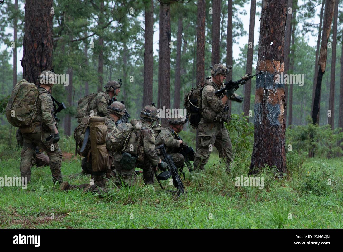 Soldiers from Task Force Guardian assault an objective during the 41st ...