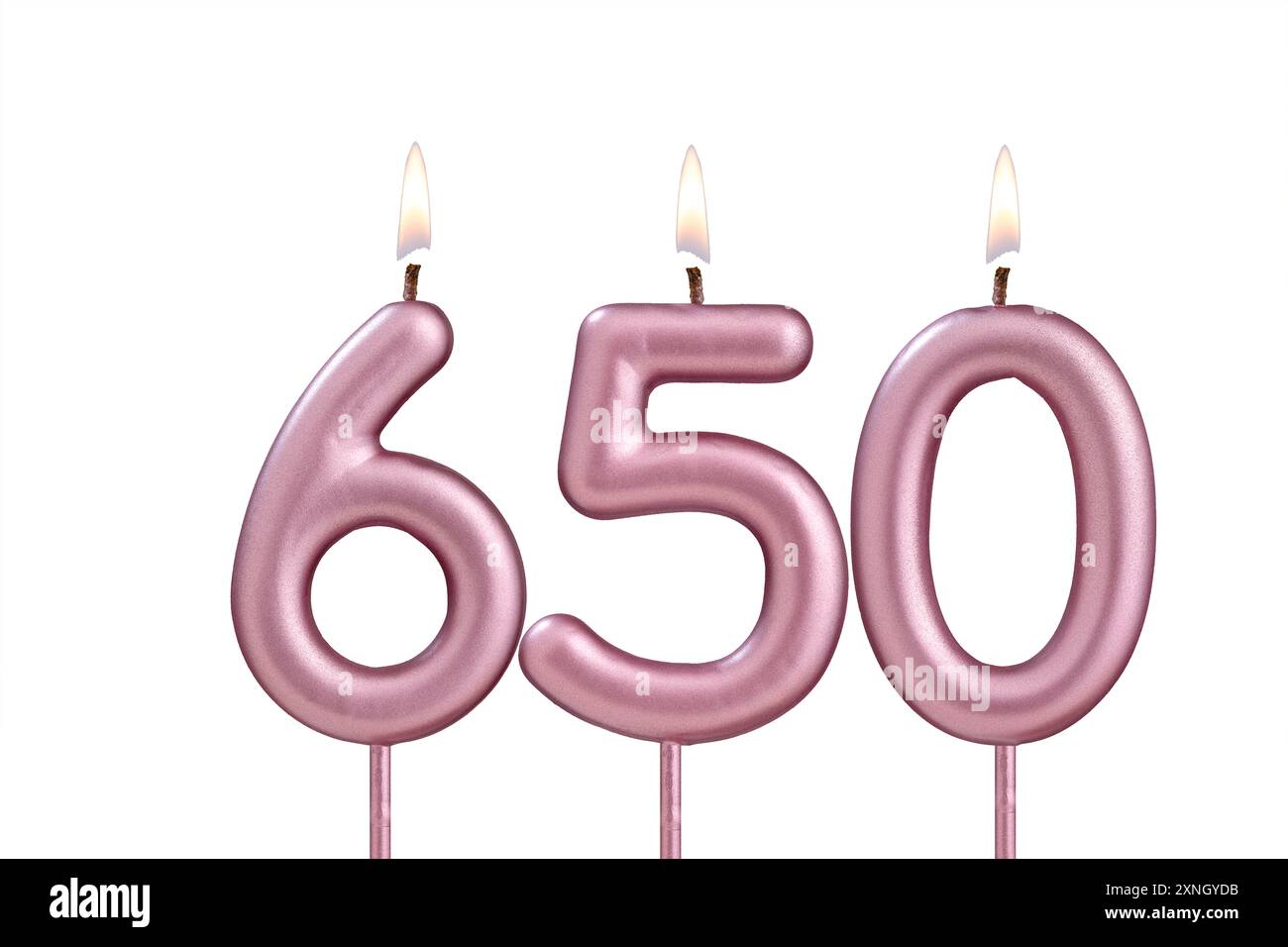 Lit birthday candle - Candle number 650 on white background Stock Photo ...