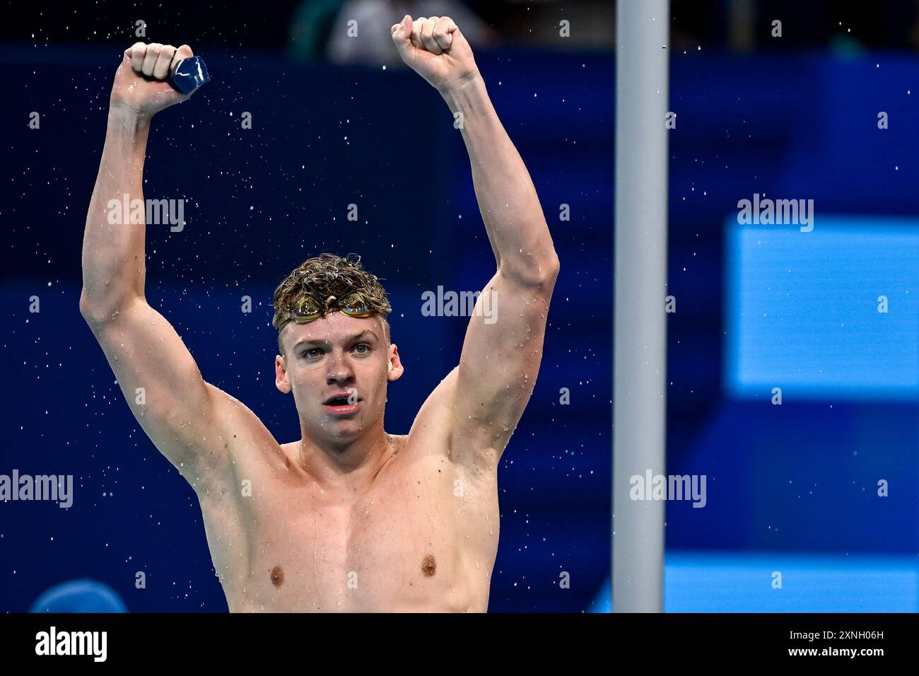 Paris, France. 31st July, 2024. Leon Marchand of France celebrates ...