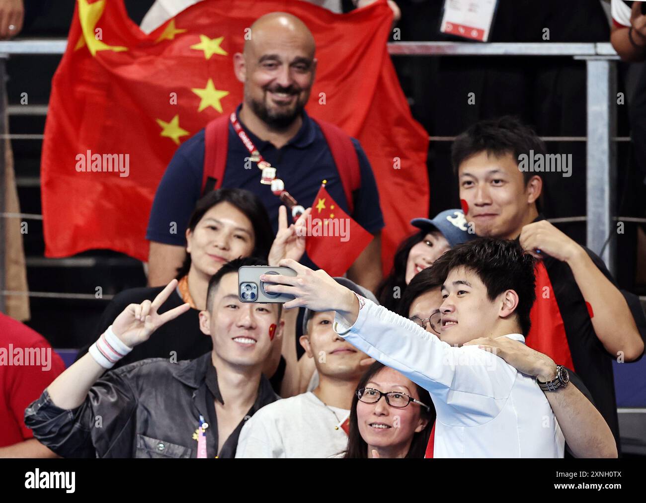Paris, France. 31st July, 2024. Gold medalist Pan Zhanle (1st R, front ...