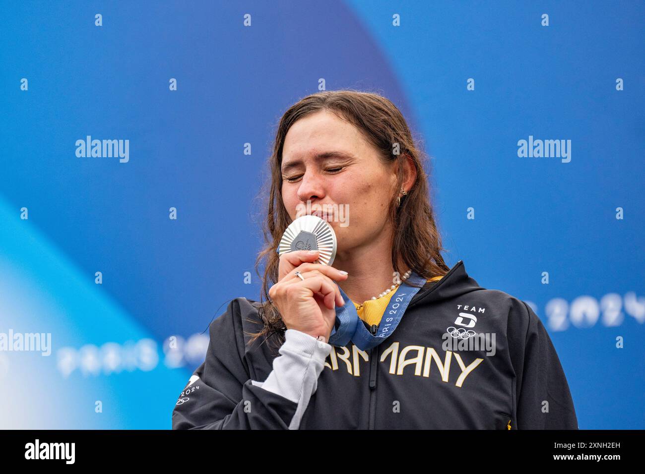 Paris, France. 31st July, 2024. Elena Lilik of Germany kisses her medal ...