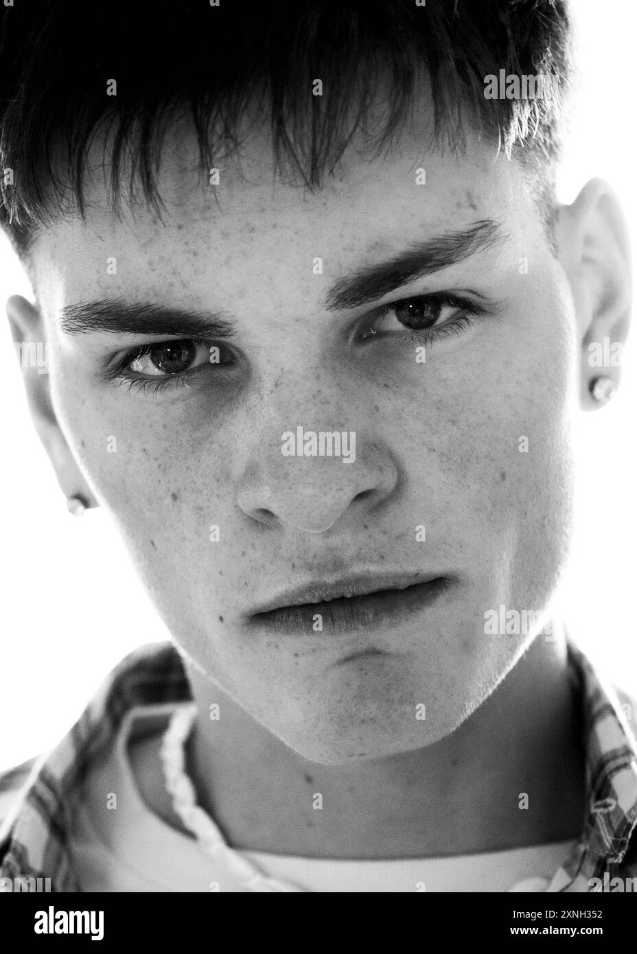 serious portrait of boy really thinking closeup shot. strong portrait ...