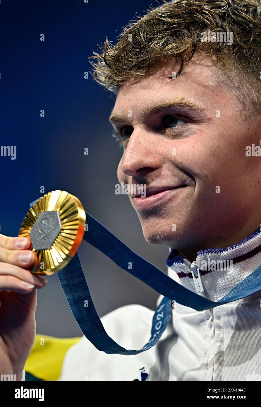 Paris, France. 31st July, 2024. Gold medalist Leon Marchand of France ...