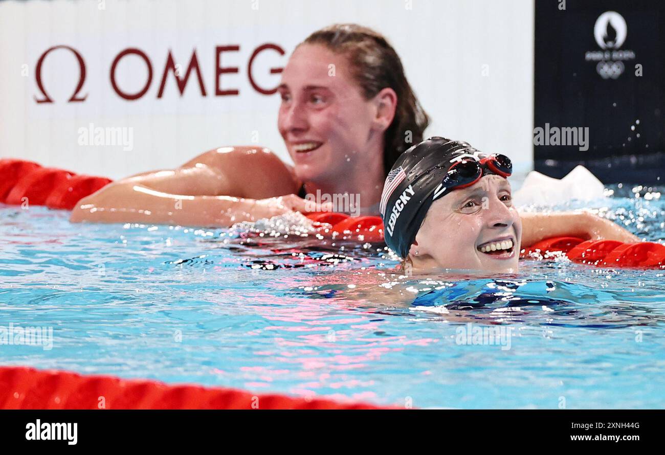 Paris, France. 31st July, 2024. Katie Ledecky (R) of the United States ...