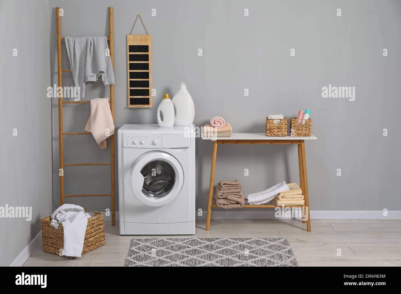 Washing machine, ladder, detergents, basket, laundry and storage bench ...