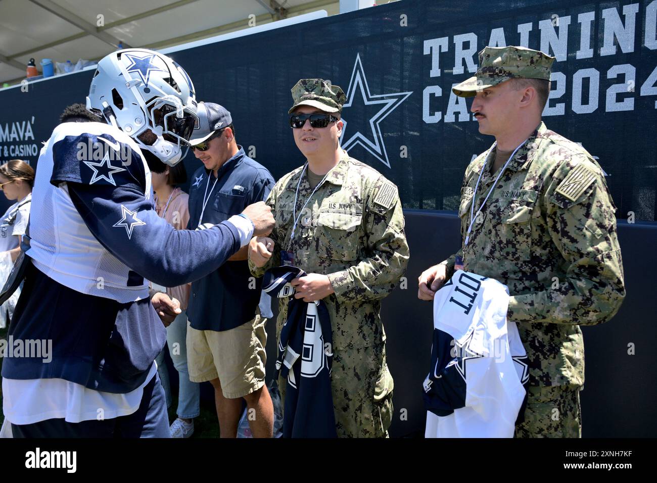 Dallas Cowboys running back Ezekiel Elliott greets members of the ...