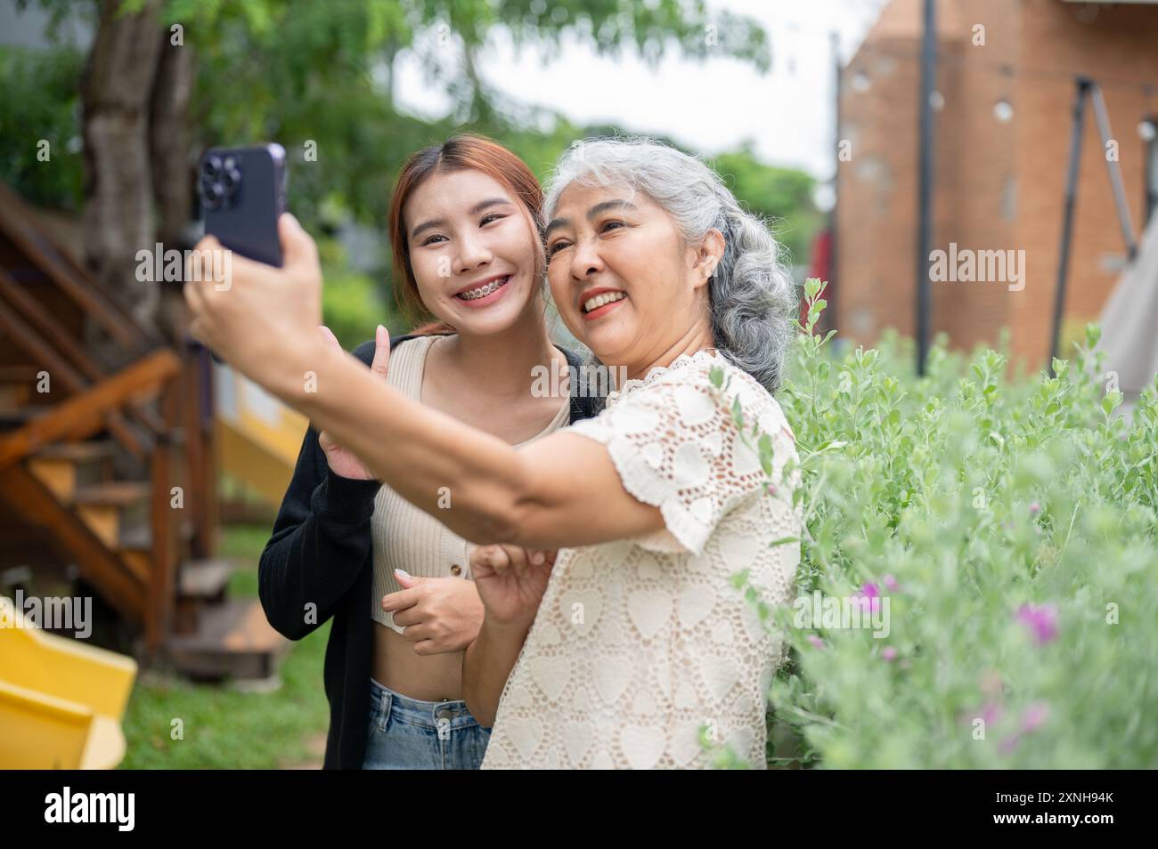 Lovely young woman having video hi-res stock photography and images - Alamy