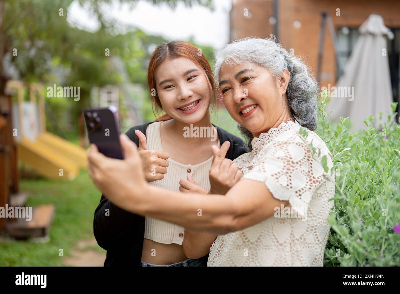 Happy asian grandparent having hi-res stock photography and images - Alamy