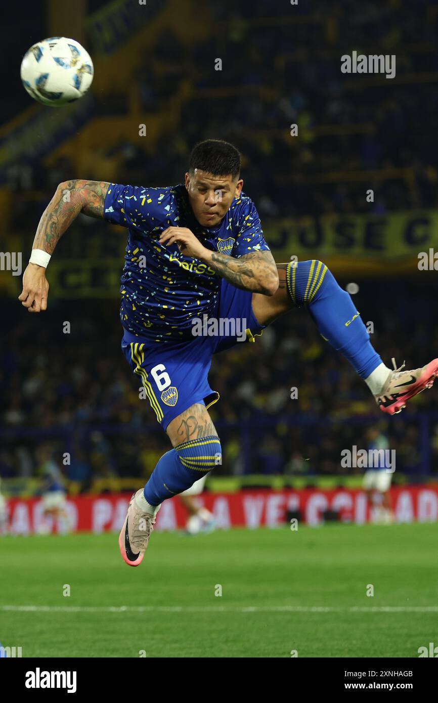 Boca Juniors' defender Marcos Rojo heads the ball during a warm up ...