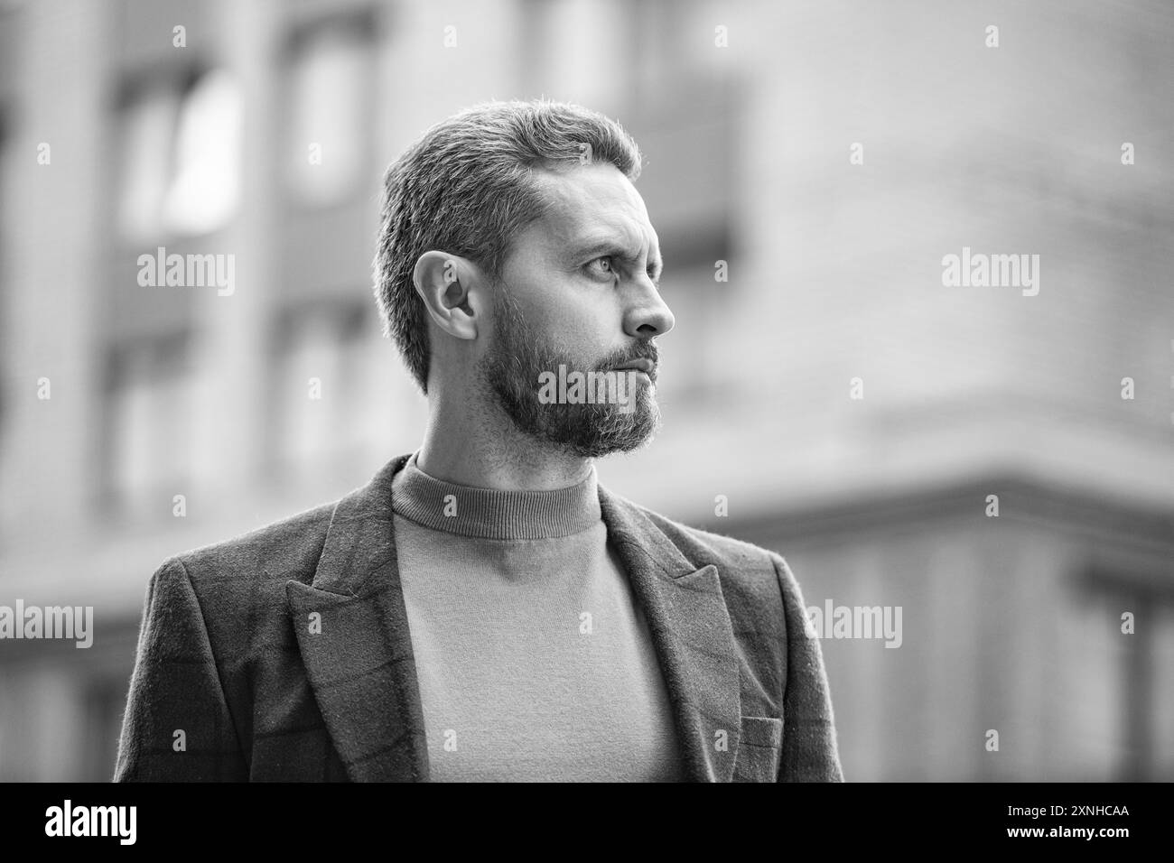portrait of man in menswear in the street. man in menswear outside ...