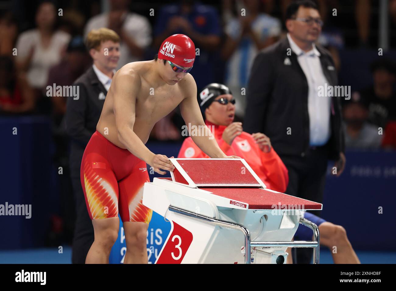 **CHINESE MAINLAND, HONG KONG, MACAU AND TAIWAN OUT** Chinese swimmer Dong Zhihao finishes the ...