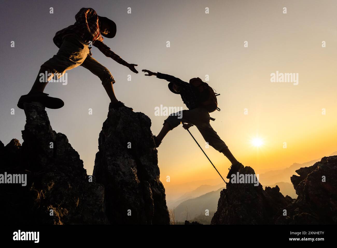 Rock climber team teamwork couple hi-res stock photography and images ...