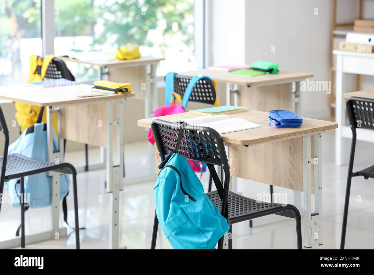Interior of modern classroom with desks and chairs at school Stock ...