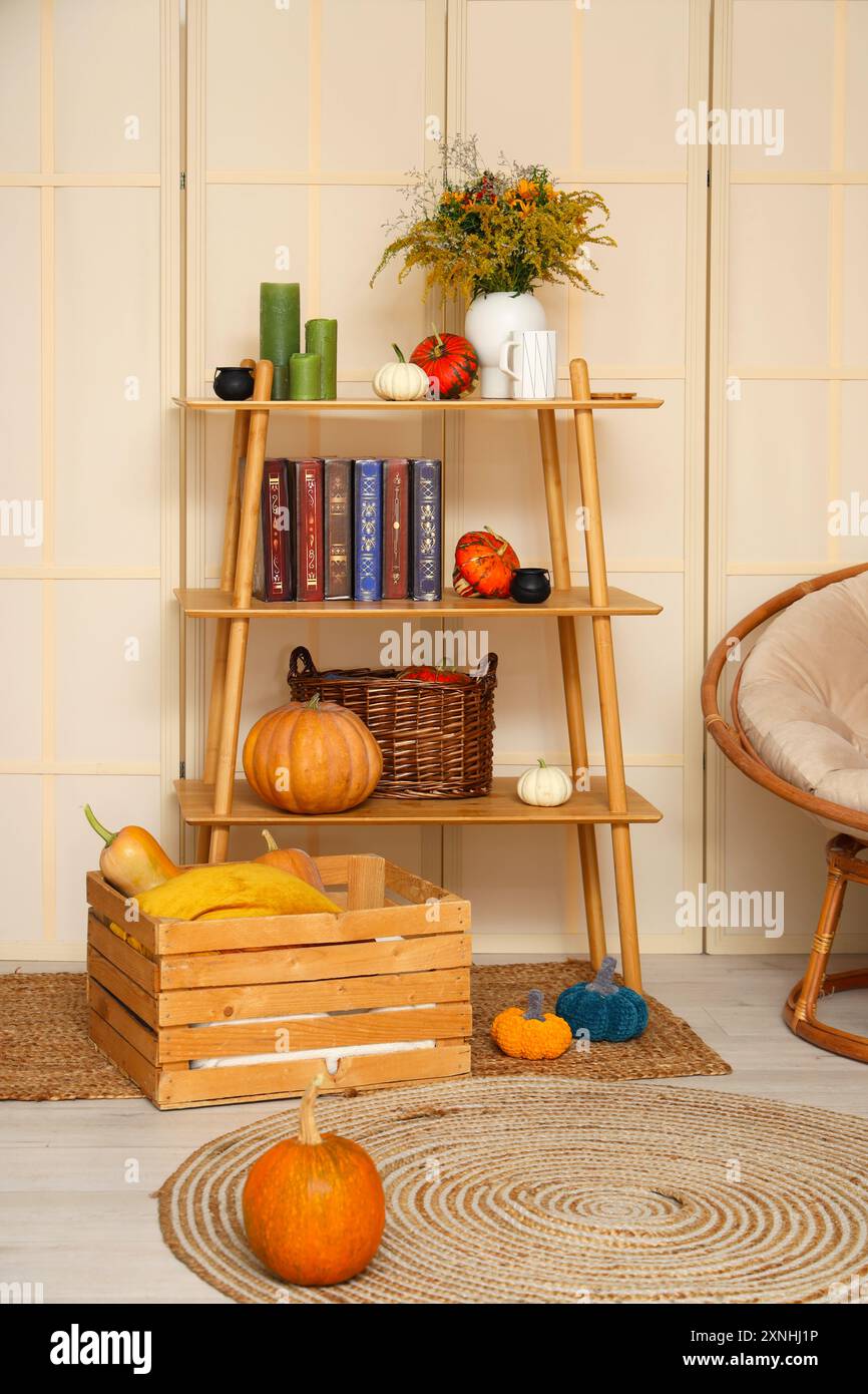 Interior of living room with shelf unit and Halloween pumpkins Stock ...