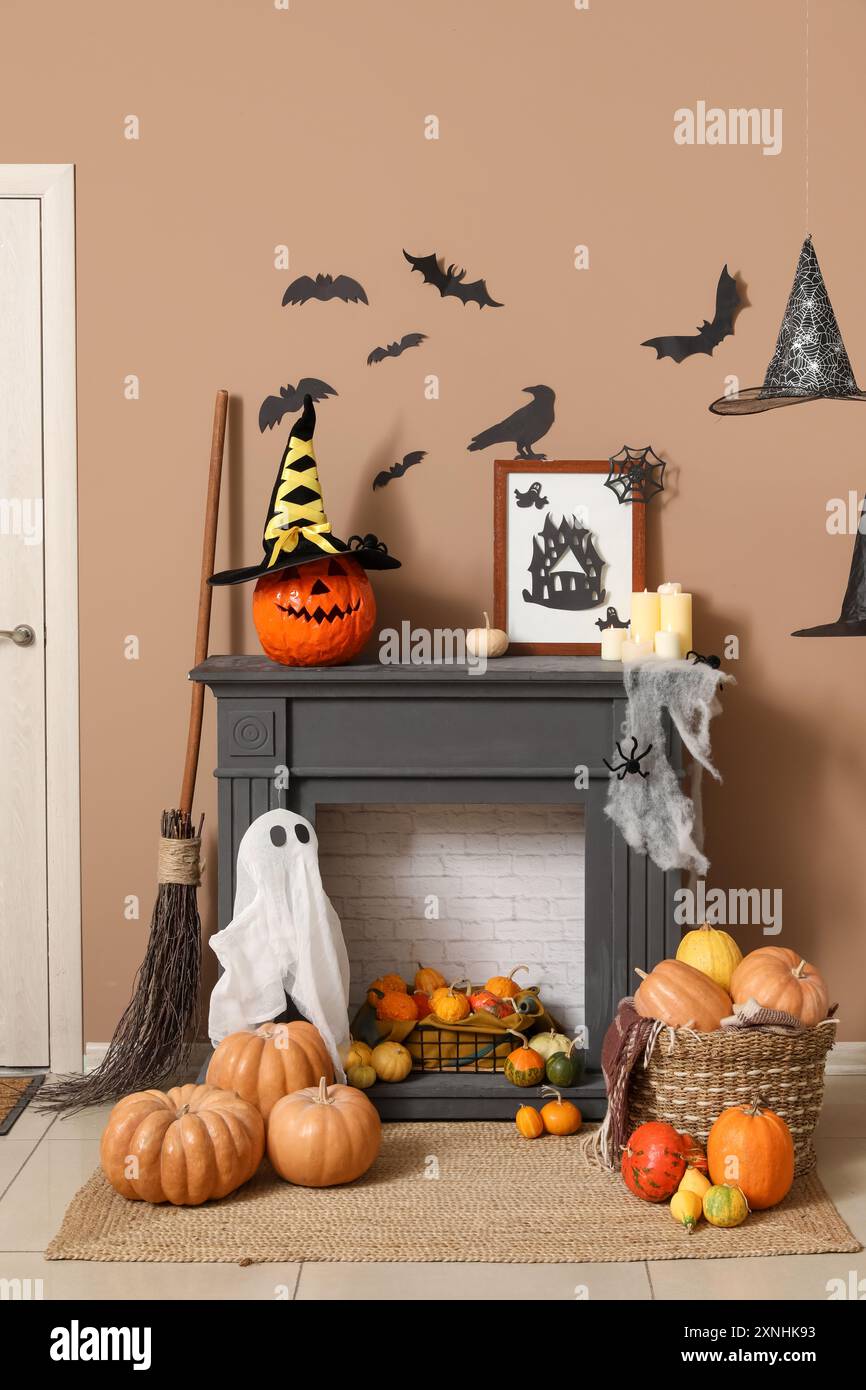 Interior of living room decorated for Halloween with pumpkins and ...