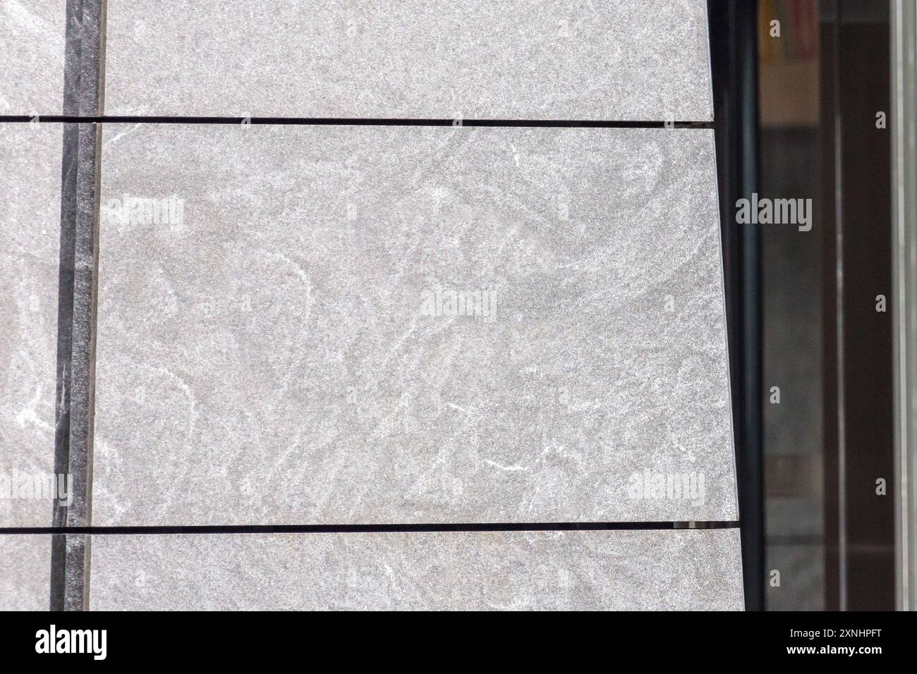 Concrete facade of an office building entrance. Empty space for logo or ...