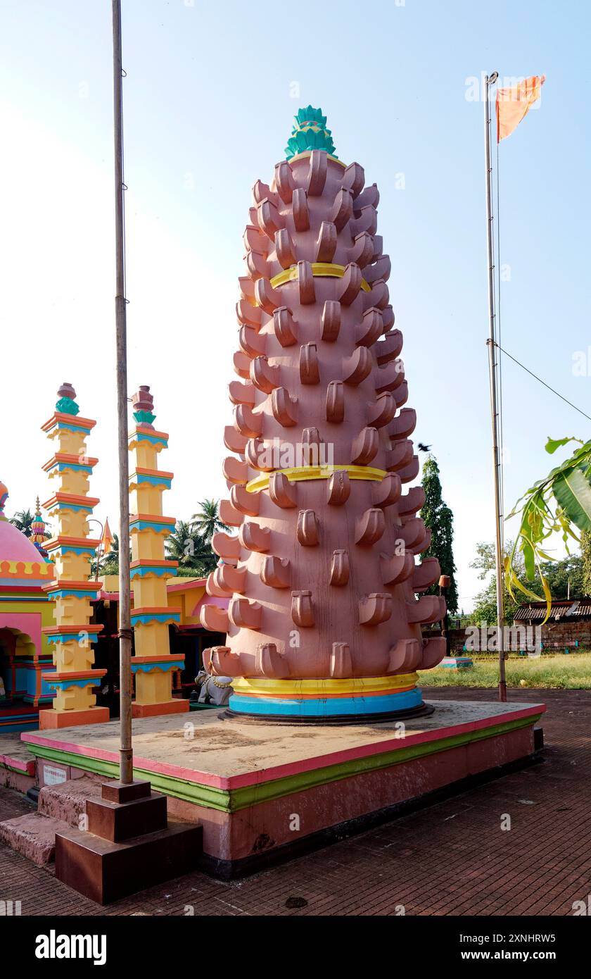 Tall stone structure Deepmala for lit oil lamps in complex of ...