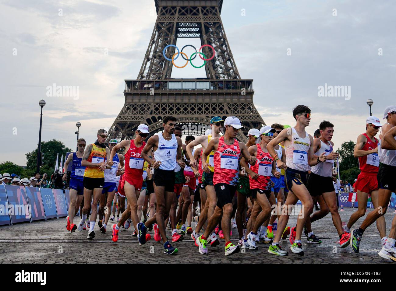 Japan's Ryo Hamanishi (56) competes alongside athletes during the men's ...