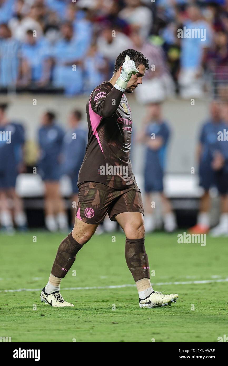 Orlando, FL: Manchester City goalkeeper Stefan Ortega (18) gives the ...