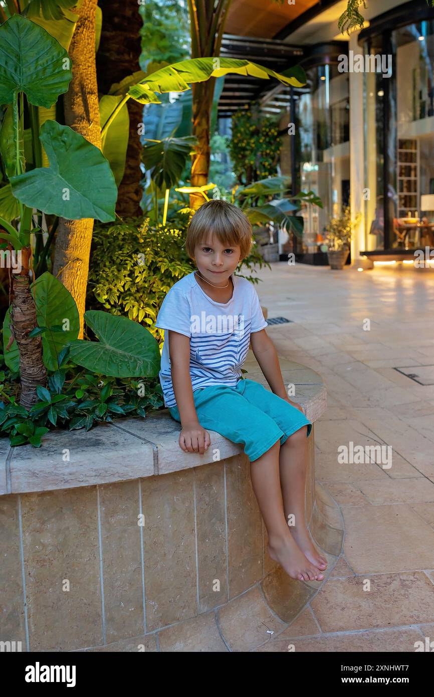 Happy child, visiting Monaco during summer, enjoying sunny days in ...