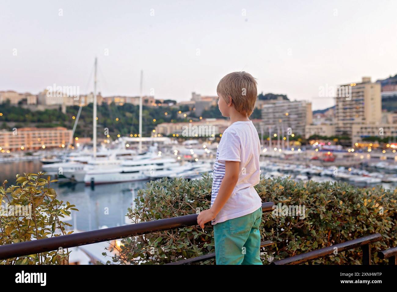 Happy child, visiting Monaco during summer, enjoying sunny days in ...