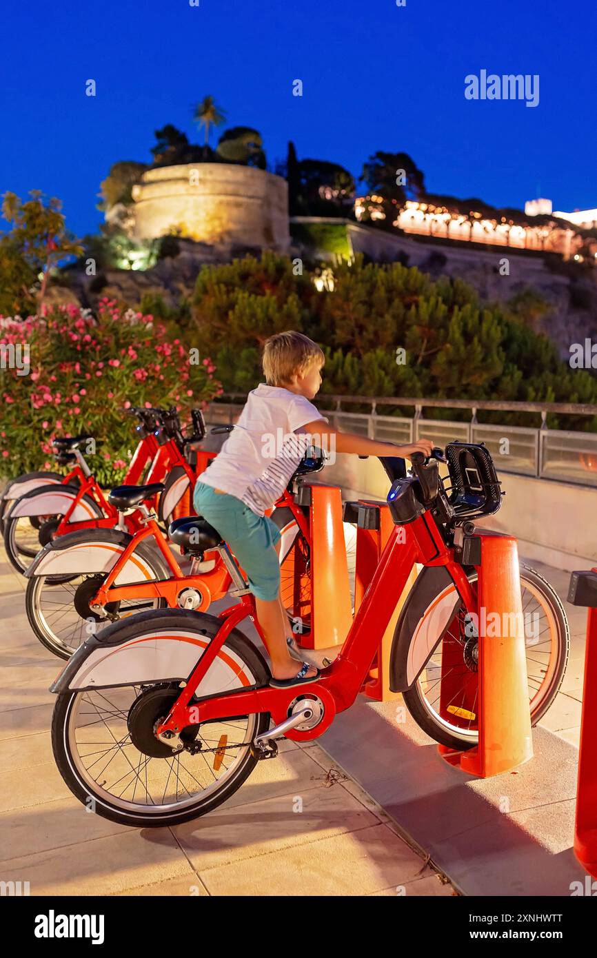 Happy child, visiting Monaco during summer, enjoying sunny days in ...